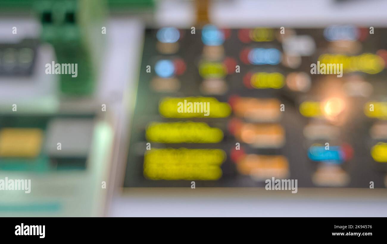 Blurred digital panel board with blinking screen. Defocused graphic ...
