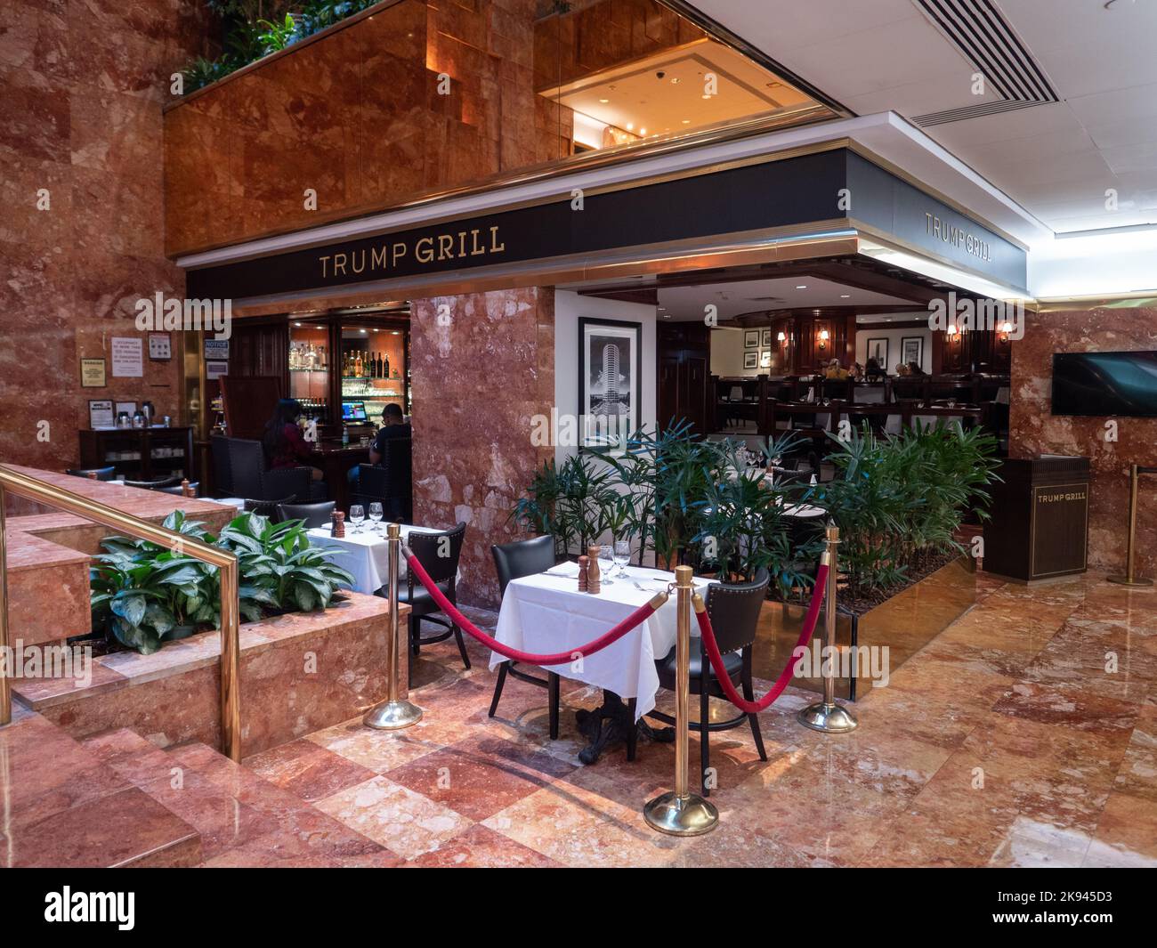 The atrium with the Trump Grill at Trump Tower in New York City. Photo ...