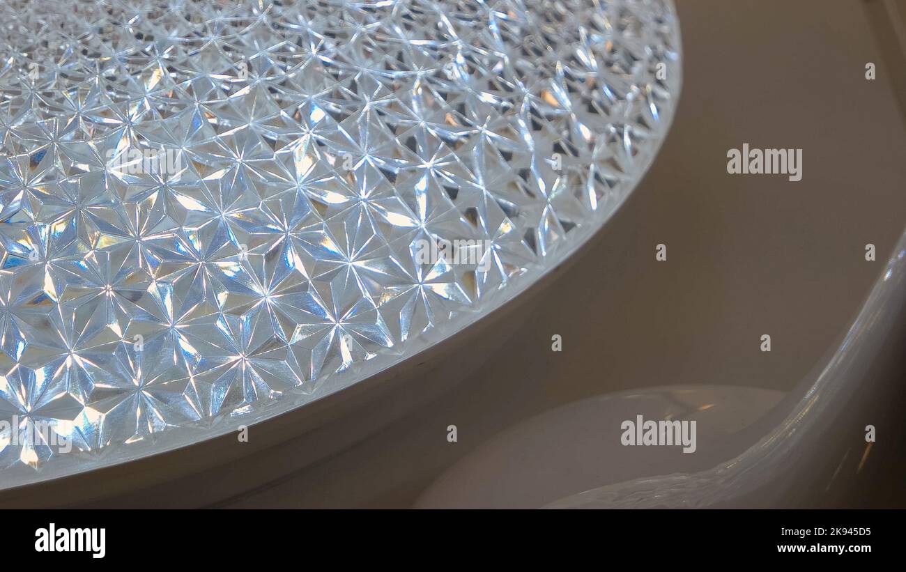 Close-up blue patterned glass texture surface. Pyramid textured metal ...