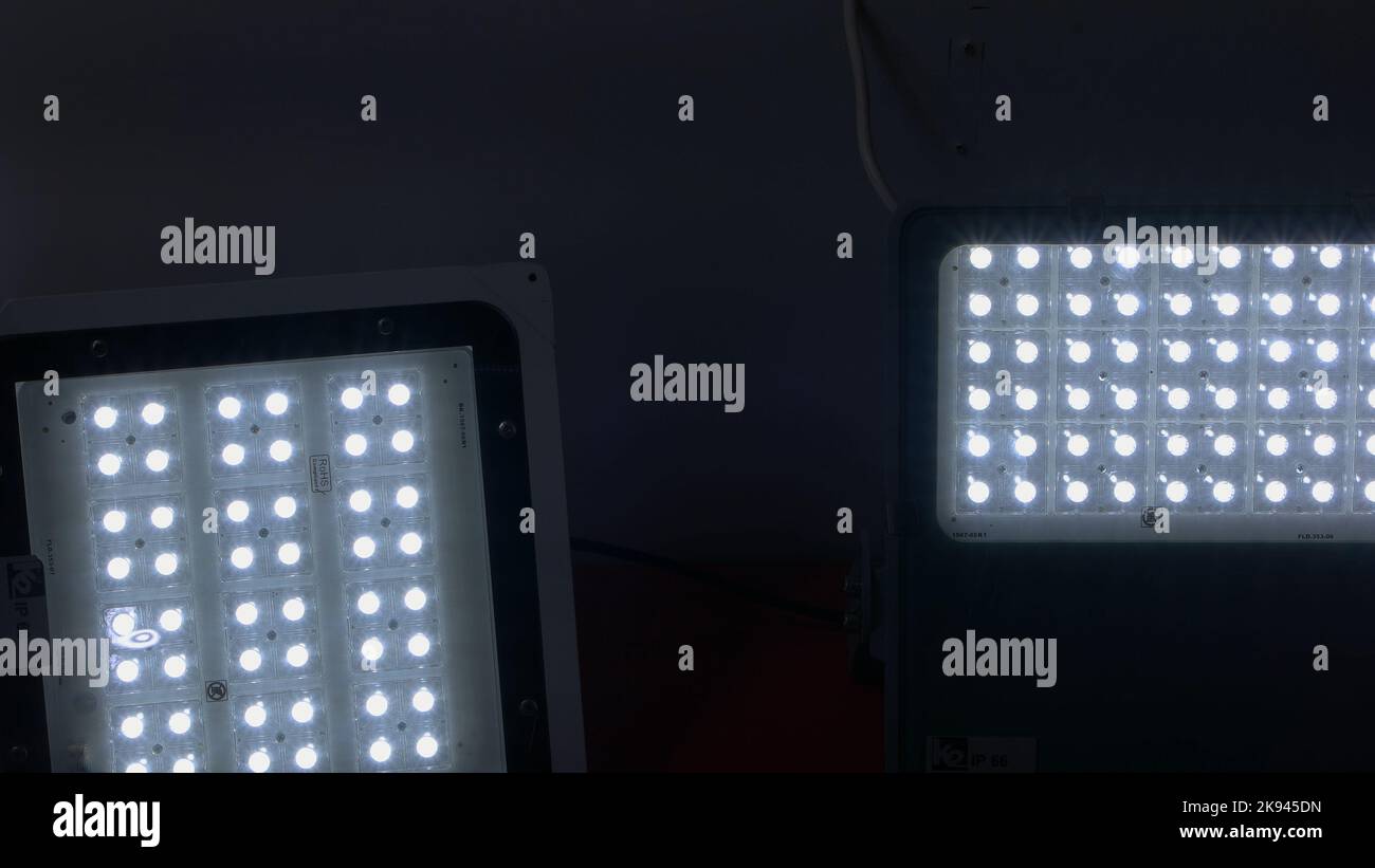 Several bright projectors in the dark room. LED diode lights Stock ...