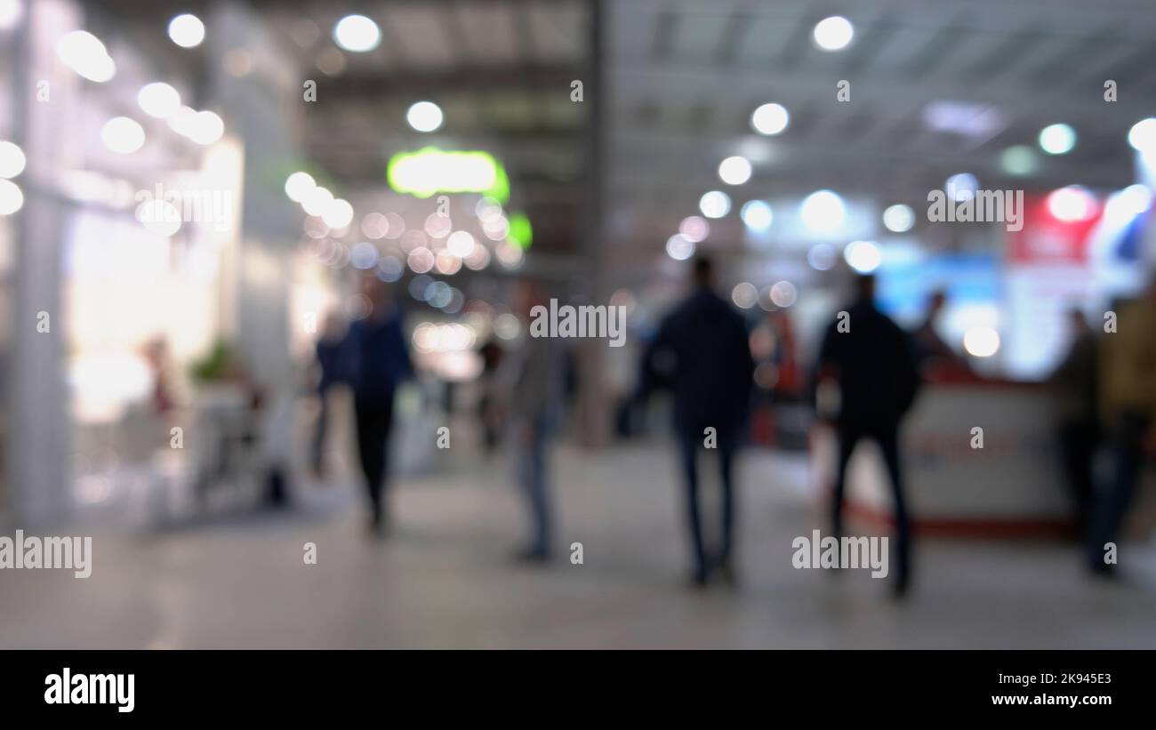 Fast speed motion of walking poeple indoors in the mall. Crowds of ...