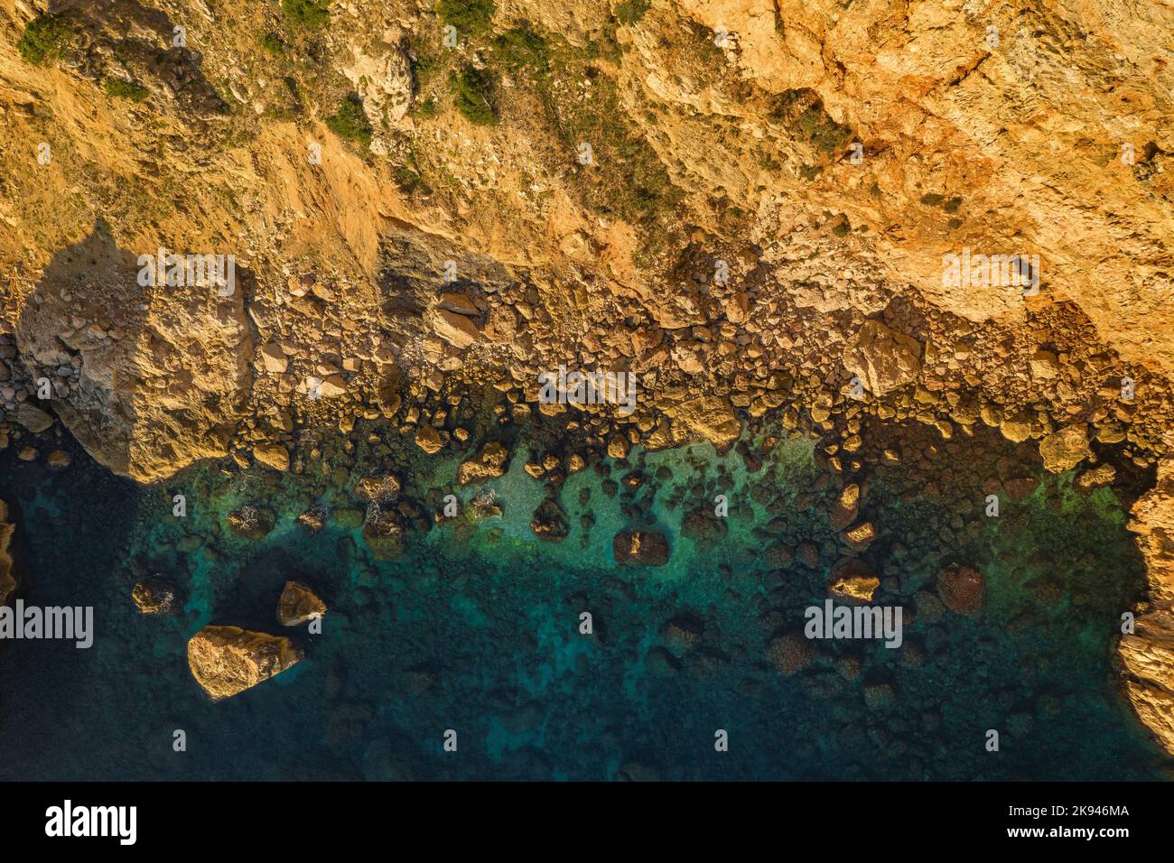 Aerial view of the Cap de la Barra cliff at sunrise. It is located in L ...