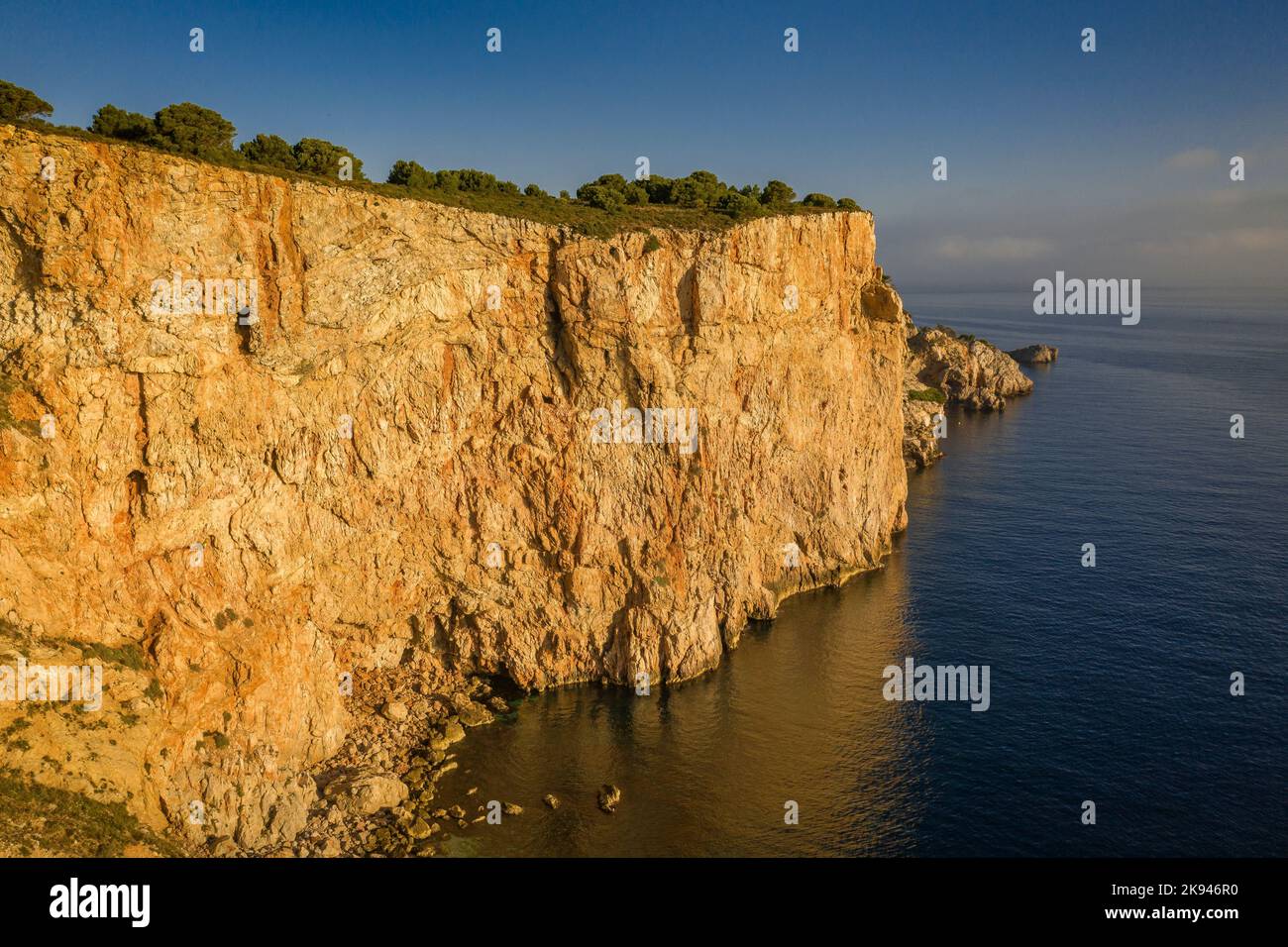Aerial view of the Cap de la Barra cliff at sunrise. It is located in L ...
