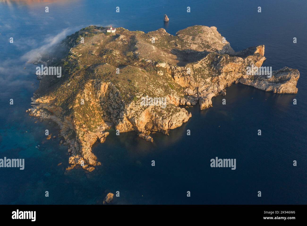 Aerial view of the Medes Islands in a foggy sunrise over the Costa ...