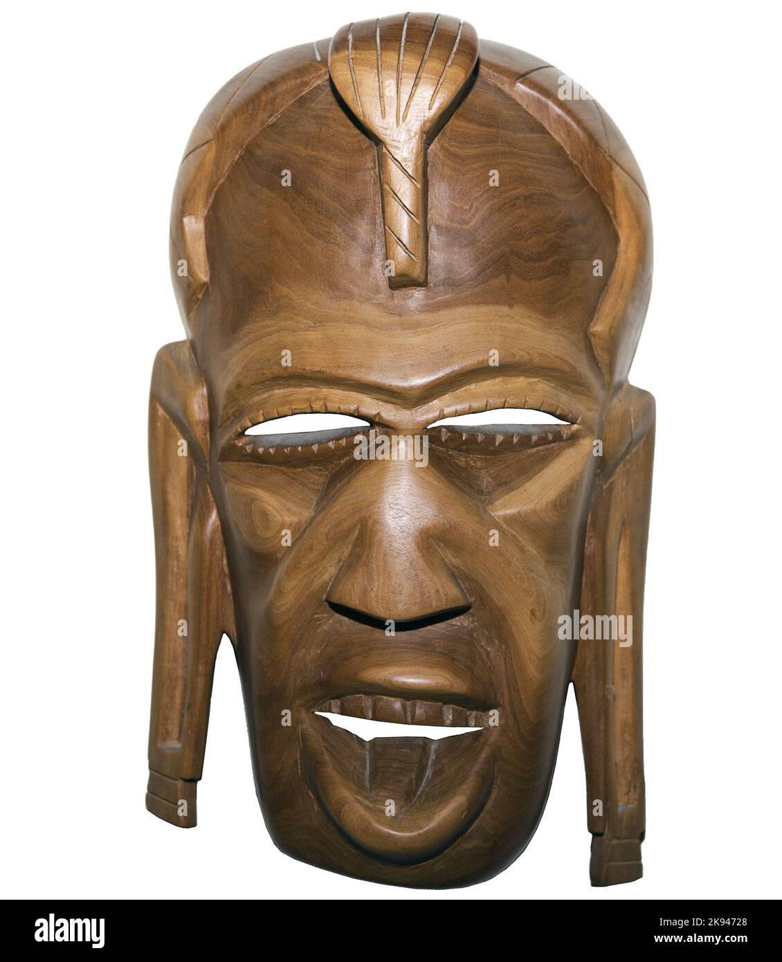 African ornamental mask carved in wood on white background Stock Photo ...