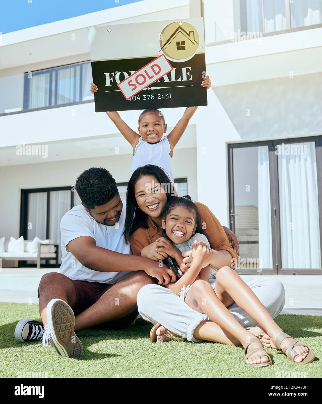 Happy family with kids, new property grass and excited homeowners in ...