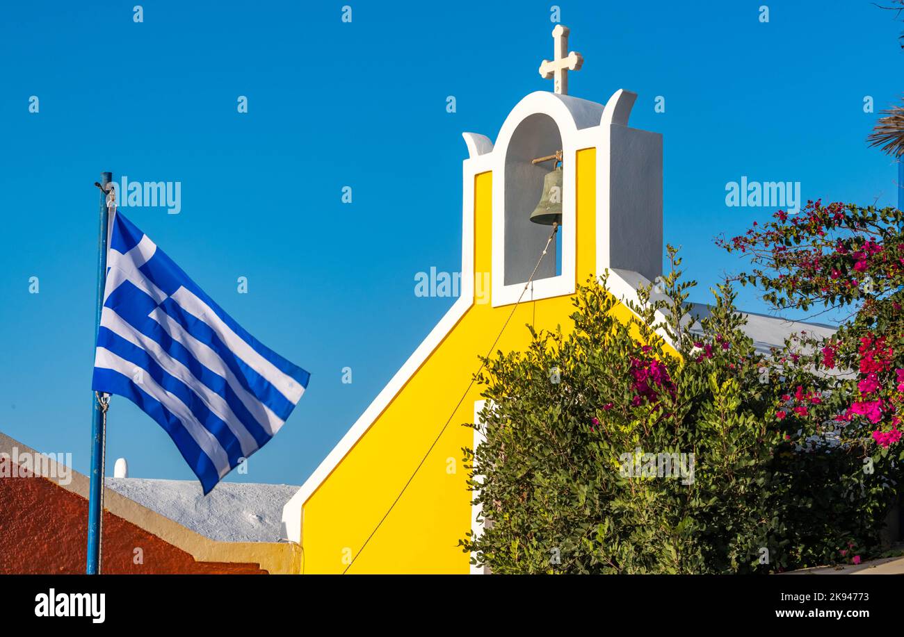 Yellow Greek Orthodox church at Oia town on Santorini island Stock ...