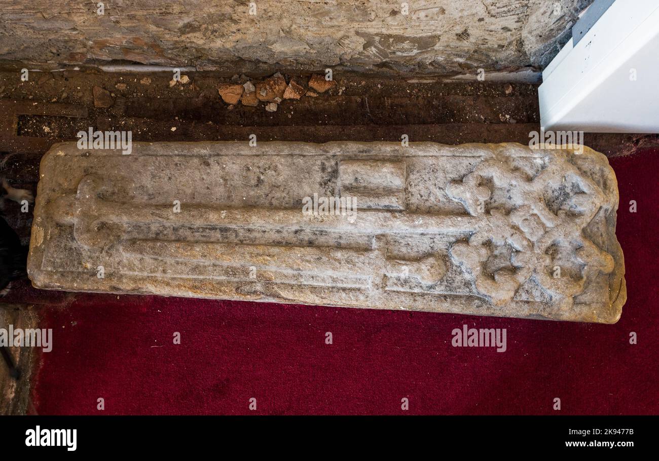 Medieval grave slab with floriated cross in St Aidans Church ...