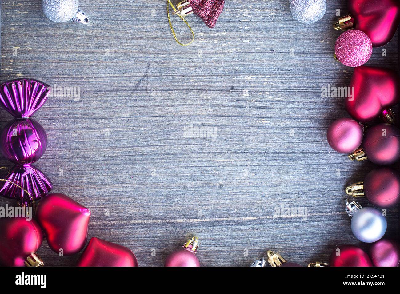 Top view to Christmas invitation frame made of New year toys, hearts ...