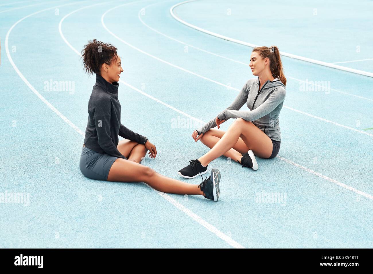 We train better when we train together. Full length shot of two ...