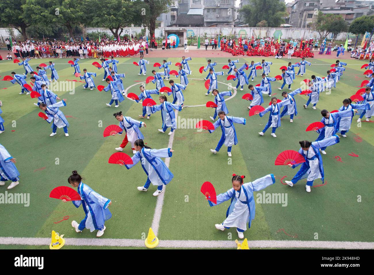 LIUZHOU, CHINA - OCTOBER 26, 2022 - Students dressed in Hanfu show fan ...