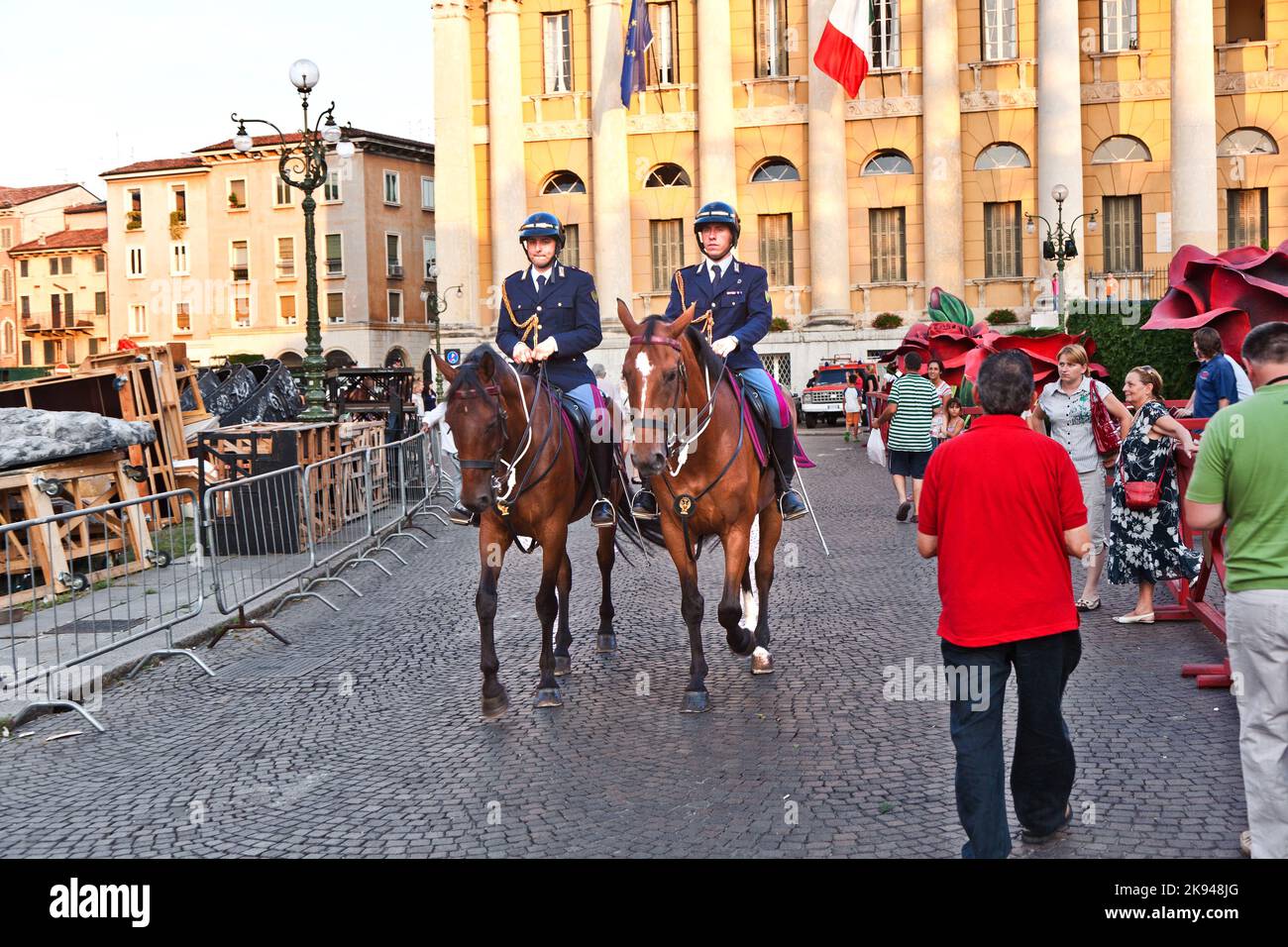 VERONA, ITALY - AUGUST 05: Police on horses are watching and helping ...