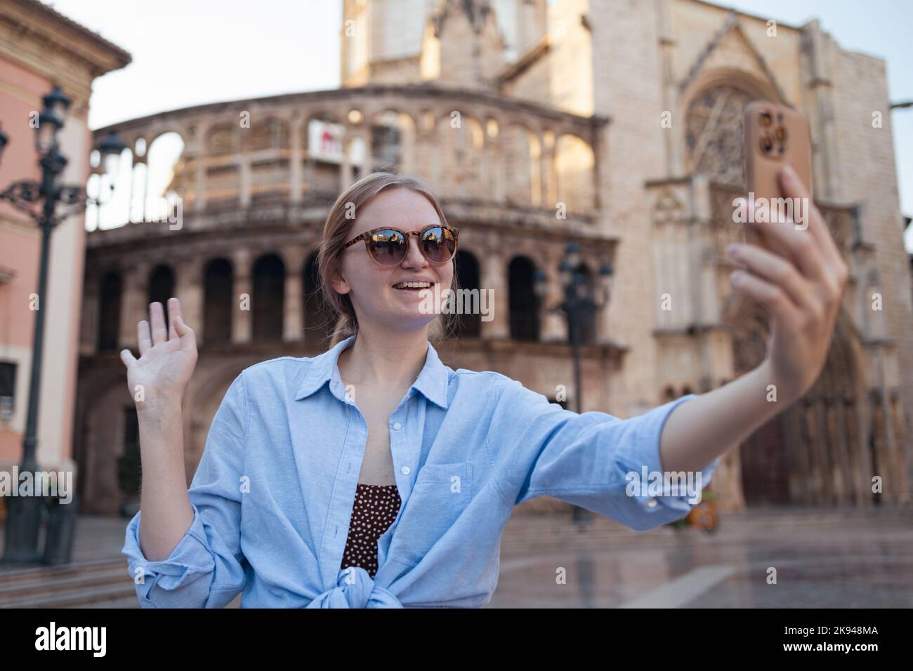 Traveler Caucasian woman taking self portrait selfie photo at the old ...