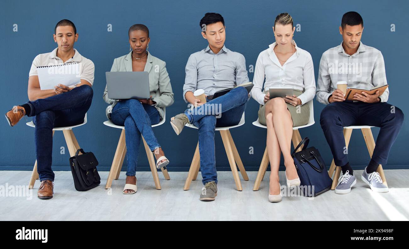 People in office waiting room, business interview for company in ...