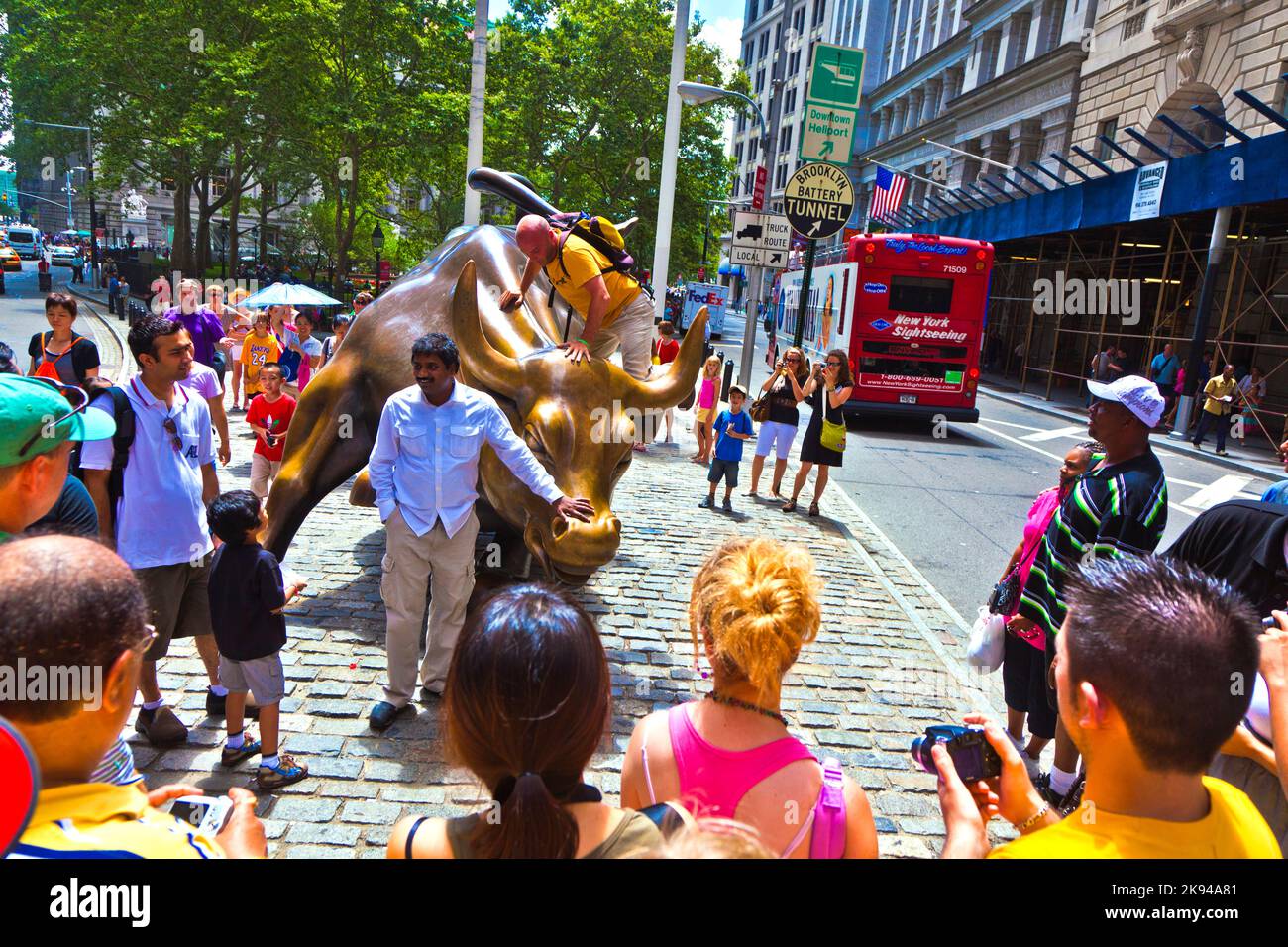 NEW YORK CITY - JULY 09: The landmark Charging Bull in Lower Manhattan represents the strength ...