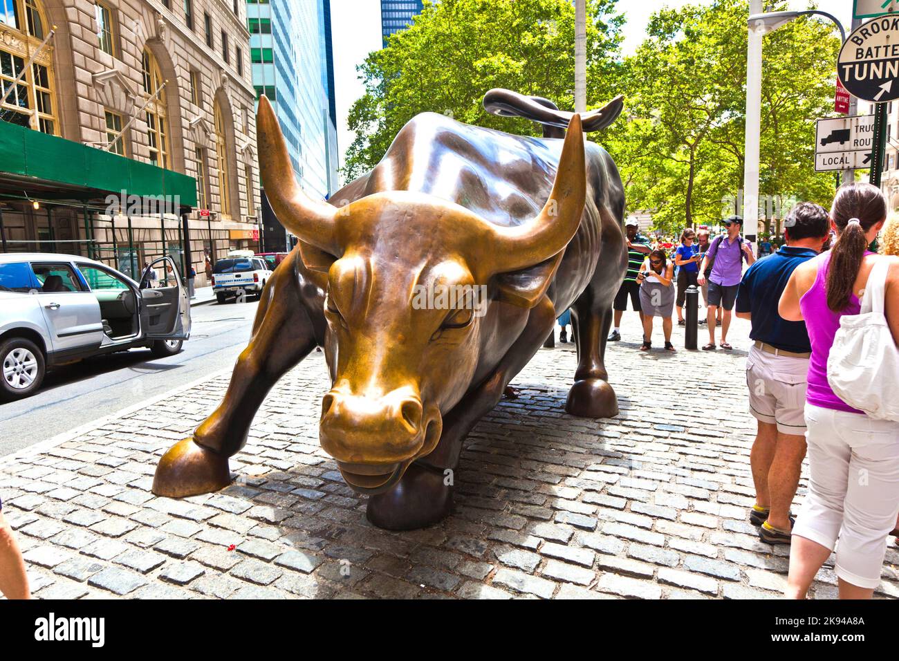 New York, USA - July 9, 2010: The landmark Charging Bull in Lower Manhattan represents the ...