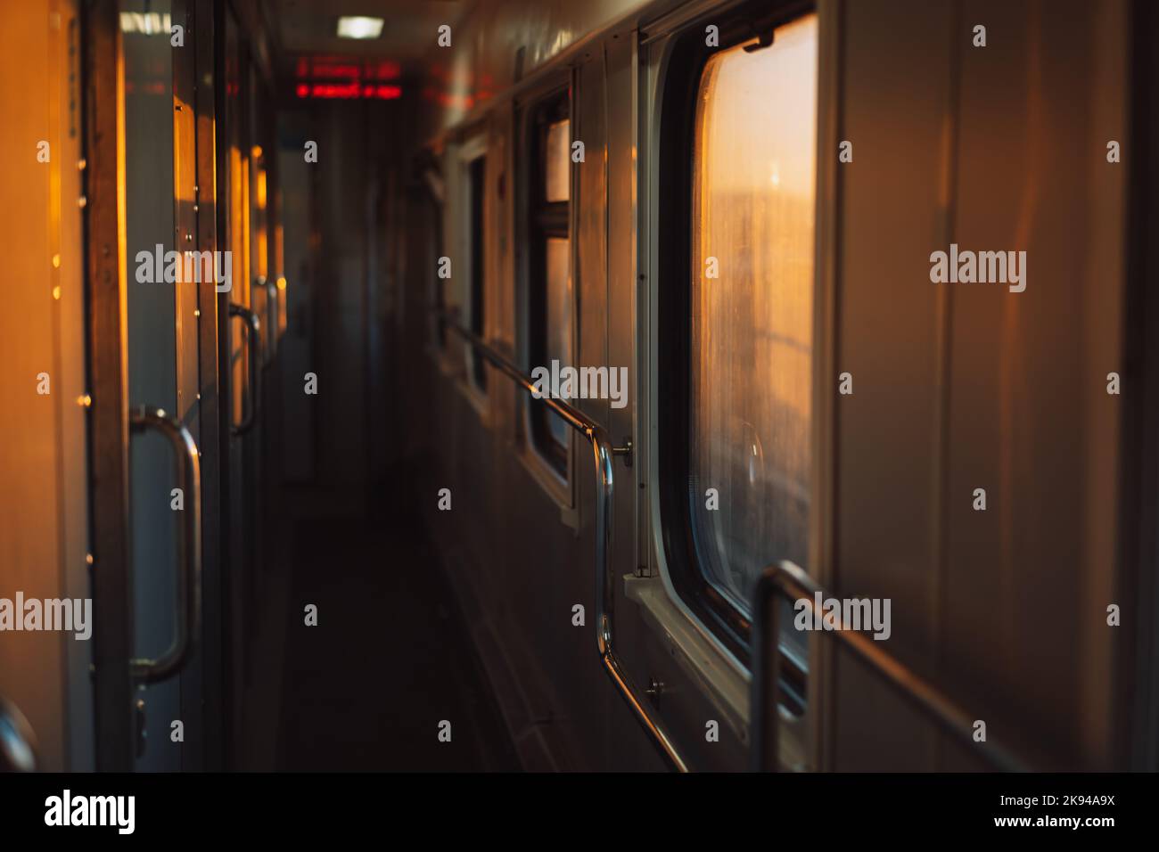 Empty compartment corridor of train carriage Stock Photo - Alamy