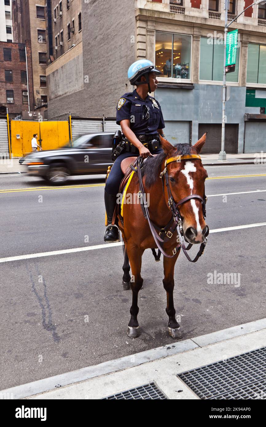 Female police officer riding horse hi-res stock photography and images ...