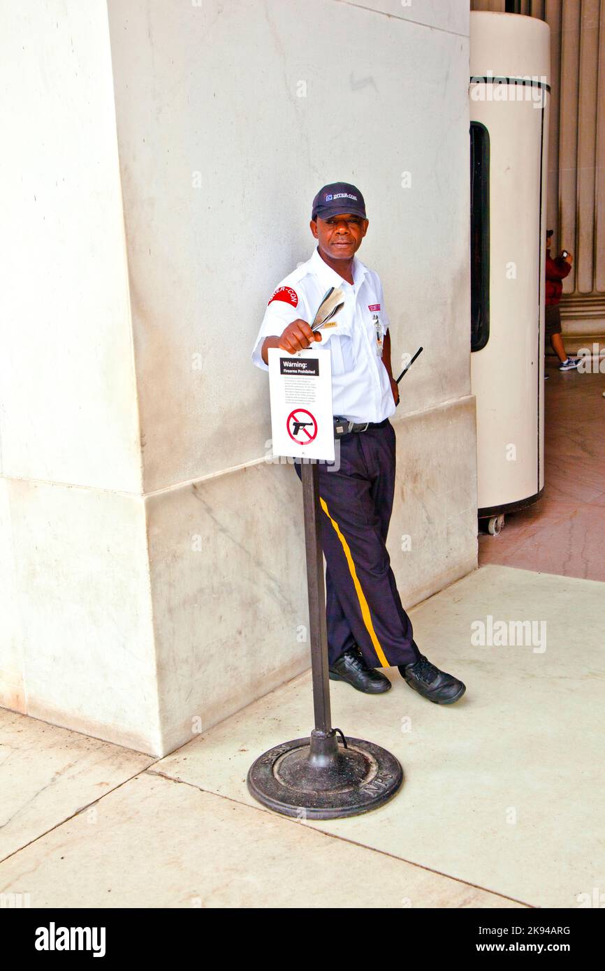 WASHINGTON - July 7: security officer pays attention that visitors ...