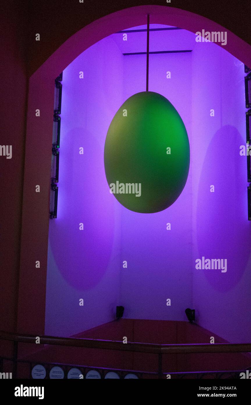 The effect of colourful lighting on a reflective surface This display ...
