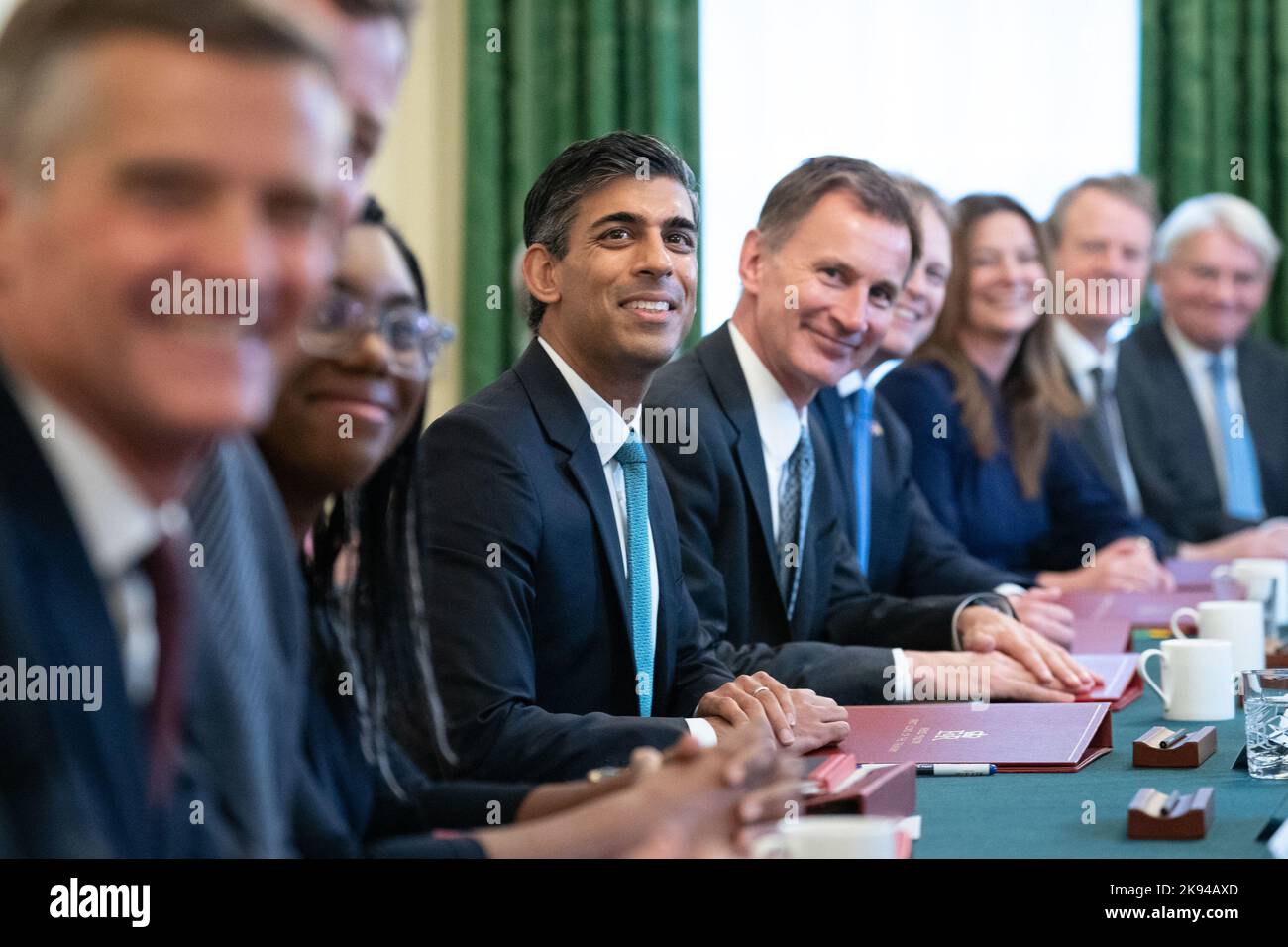 RETRANSMITTING CORRECTING POSITION OF HUNT Prime Minister Rishi Sunak (centre), alongside the ...