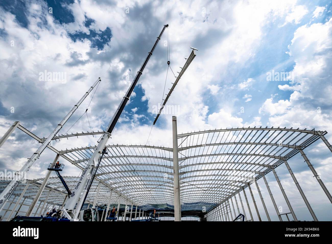 Building construction showing steel beams and working at height Stock ...