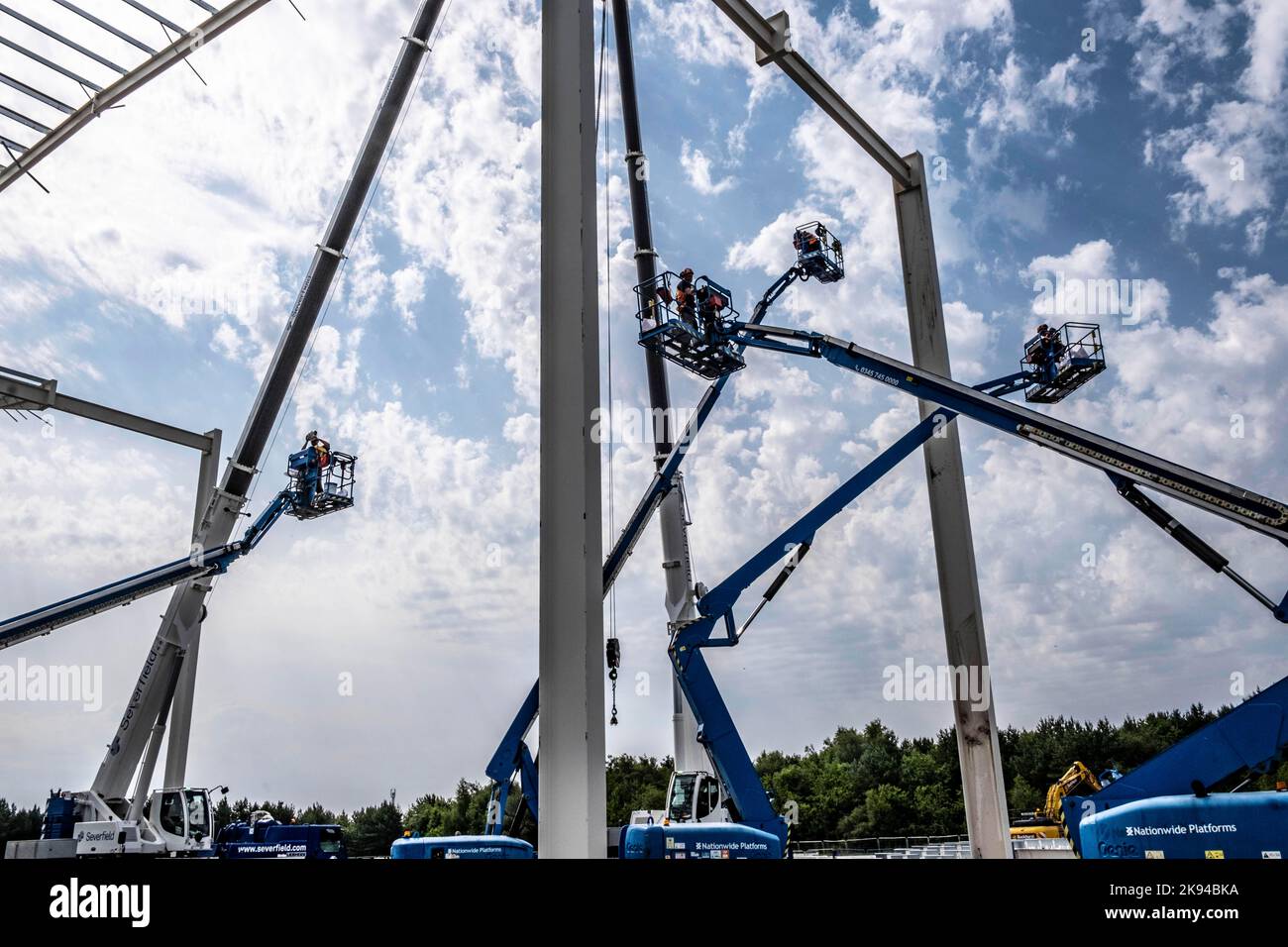 Building construction showing steel beams and working at height Stock ...