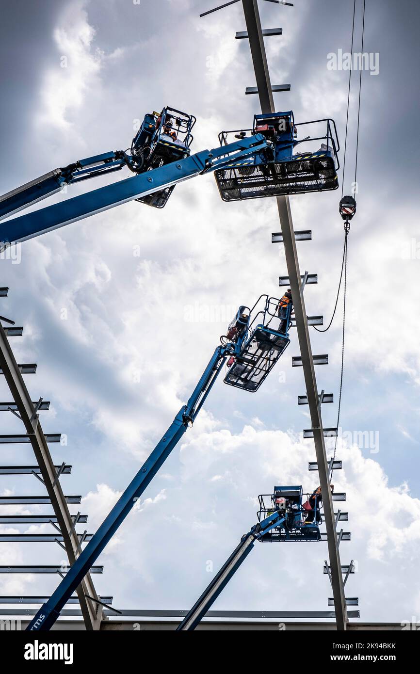 Building construction showing steel beams and working at height Stock ...