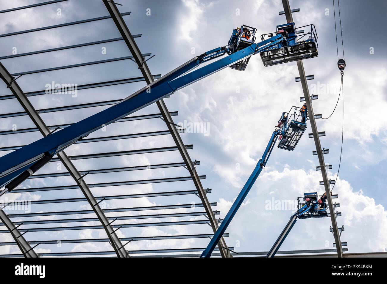 Building construction showing steel beams and working at height Stock ...