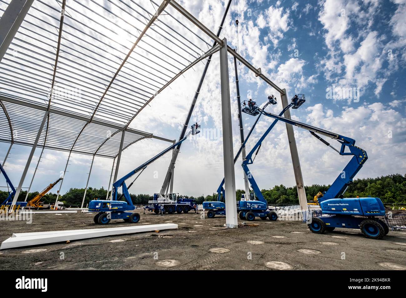 Building construction showing steel beams and working at height Stock ...