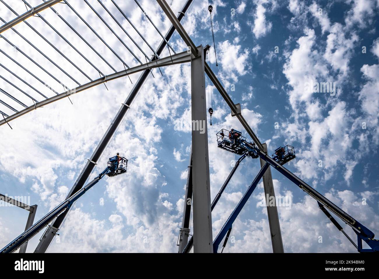 Building construction showing steel beams and working at height Stock ...