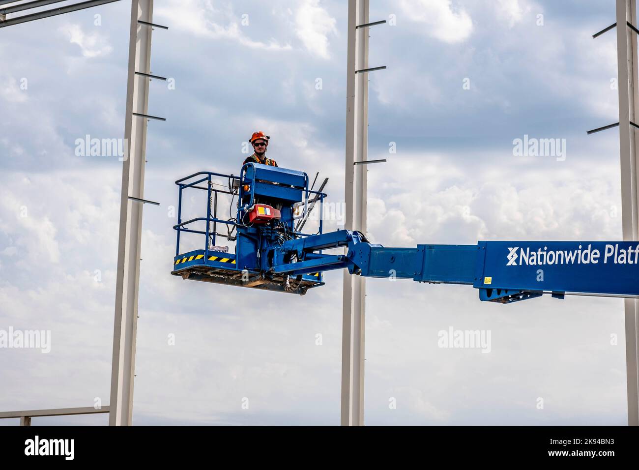 Building construction showing steel beams and working at height Stock ...