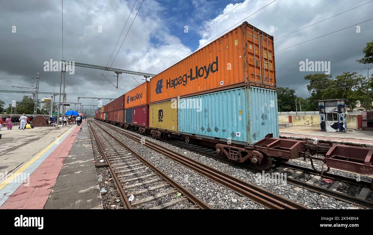A Double-decker Cargo train Stationary under cloudy sky Stock Photo - Alamy