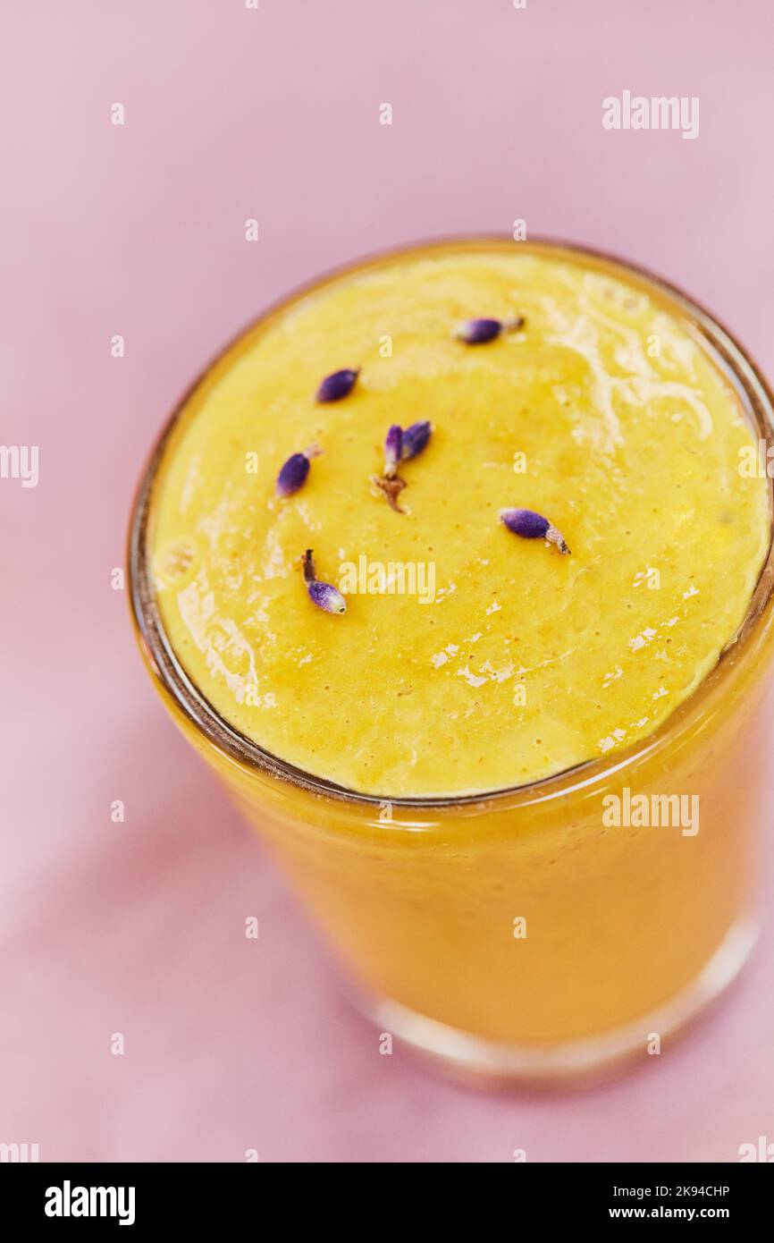 So simple, so nutritious. a freshly made healthy smoothie on a table ...