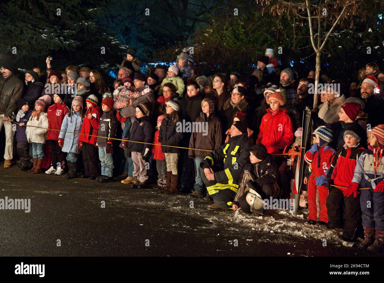 Schwalbach, Germany - December 4, 2010: audience at a fire spectacle at ...