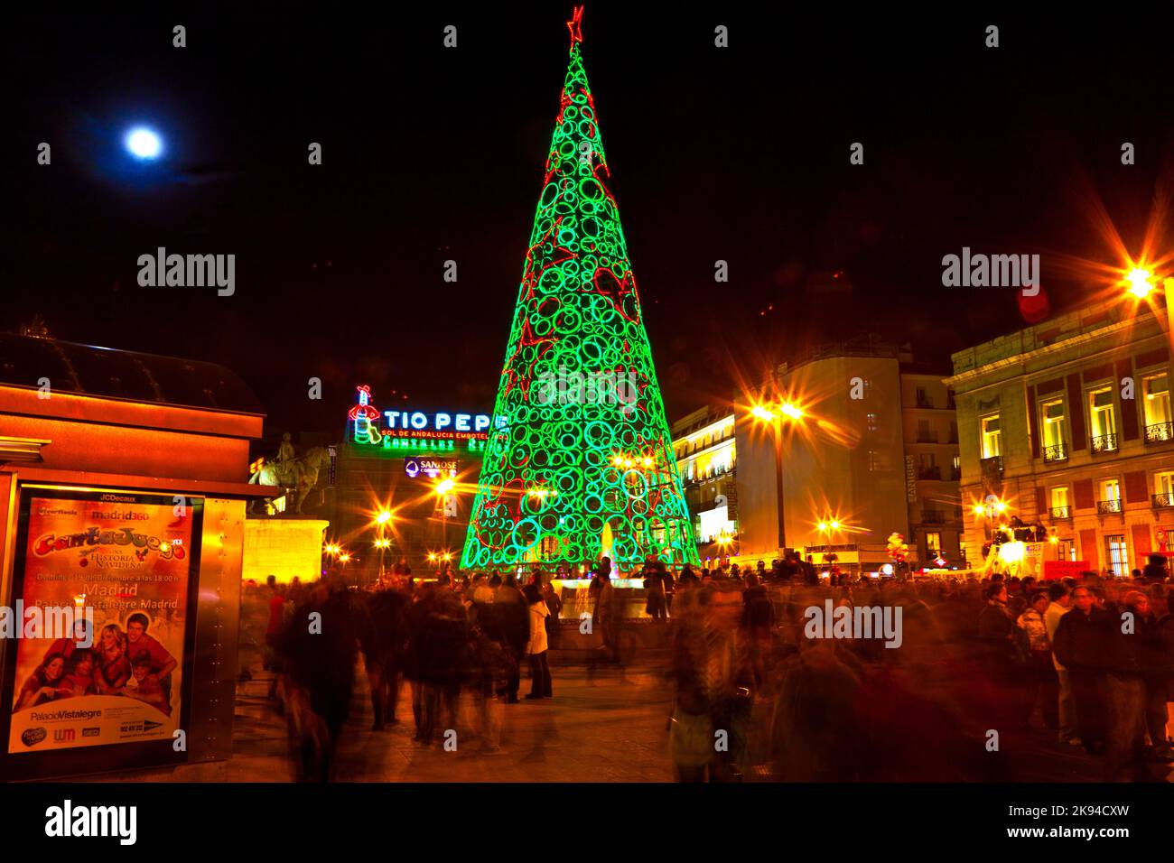MADRID, SPAIN - DECEMBER 22: People have fun in Christmas time passing ...