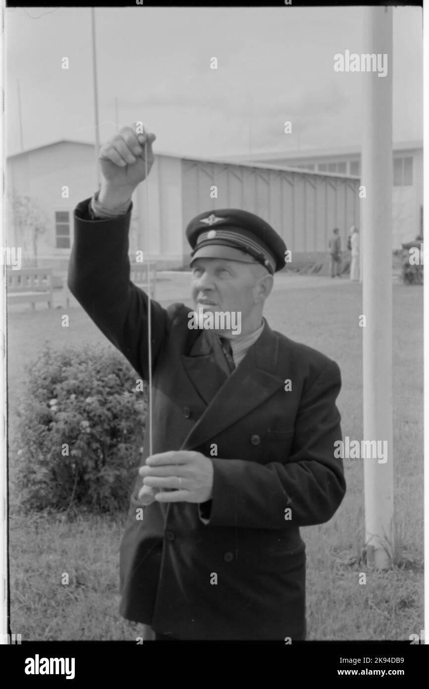 Railway man raises the flag Stock Photo - Alamy
