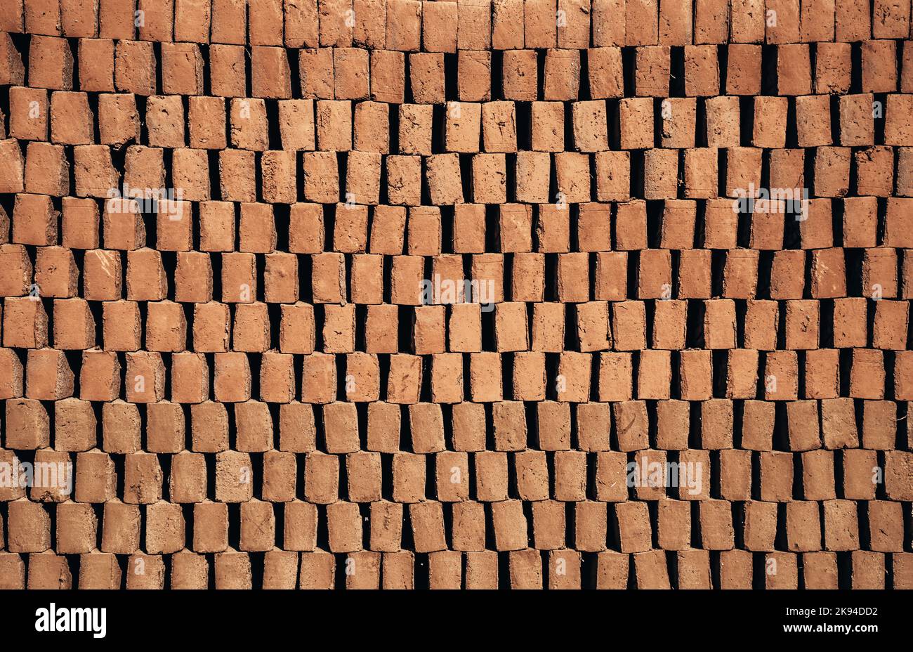 Dark red brick background Stock Photo - Alamy