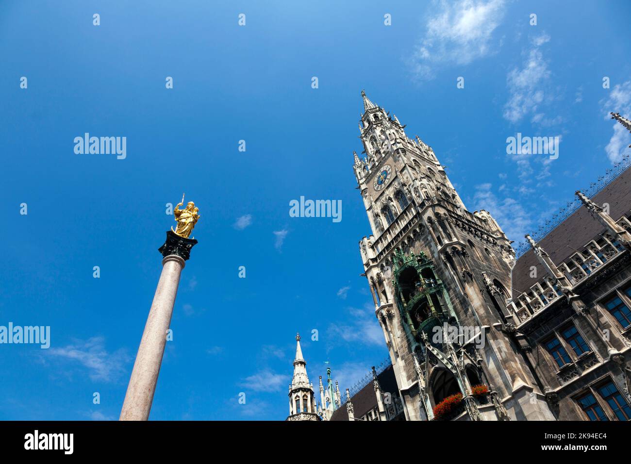 MUNICH, GERMANY - JULY 9: Clock of the old City Hall at Marienplatz ...
