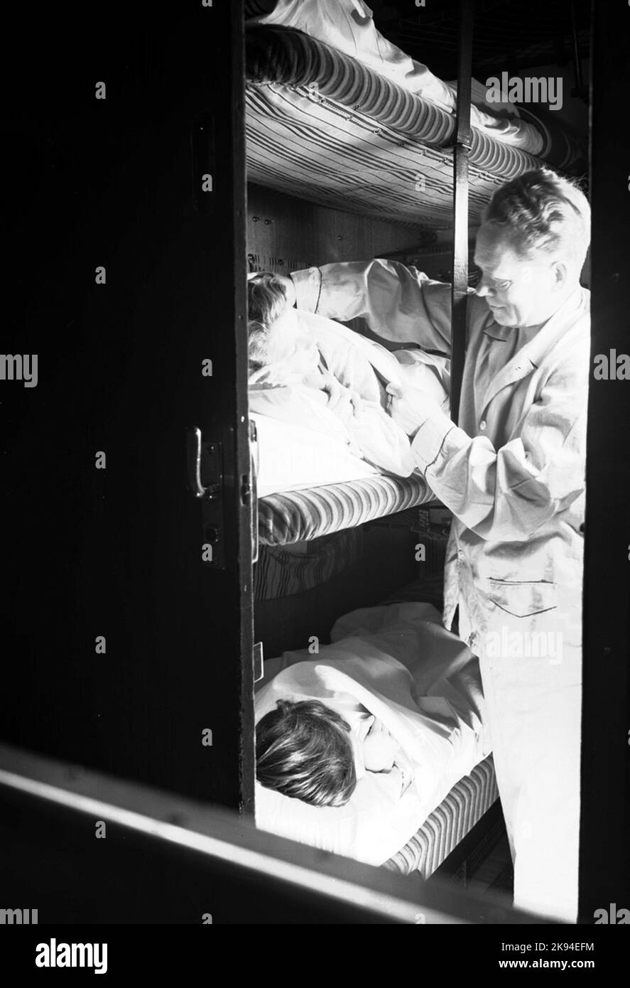 AB02C, 3rd grade sleeping car. The man nights the children Stock Photo ...