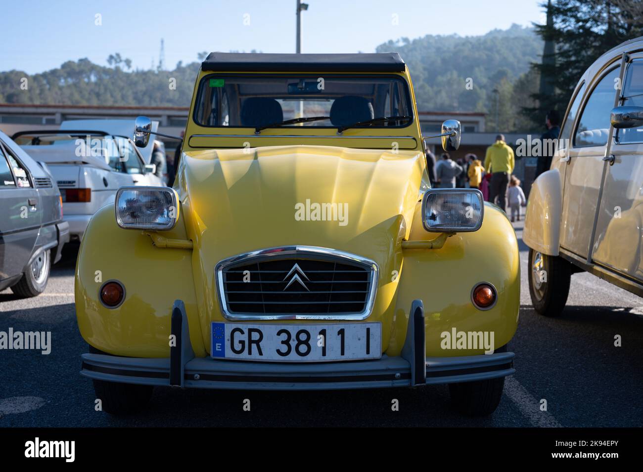 An old yellow Citroen 2CV parked outside Stock Photo - Alamy
