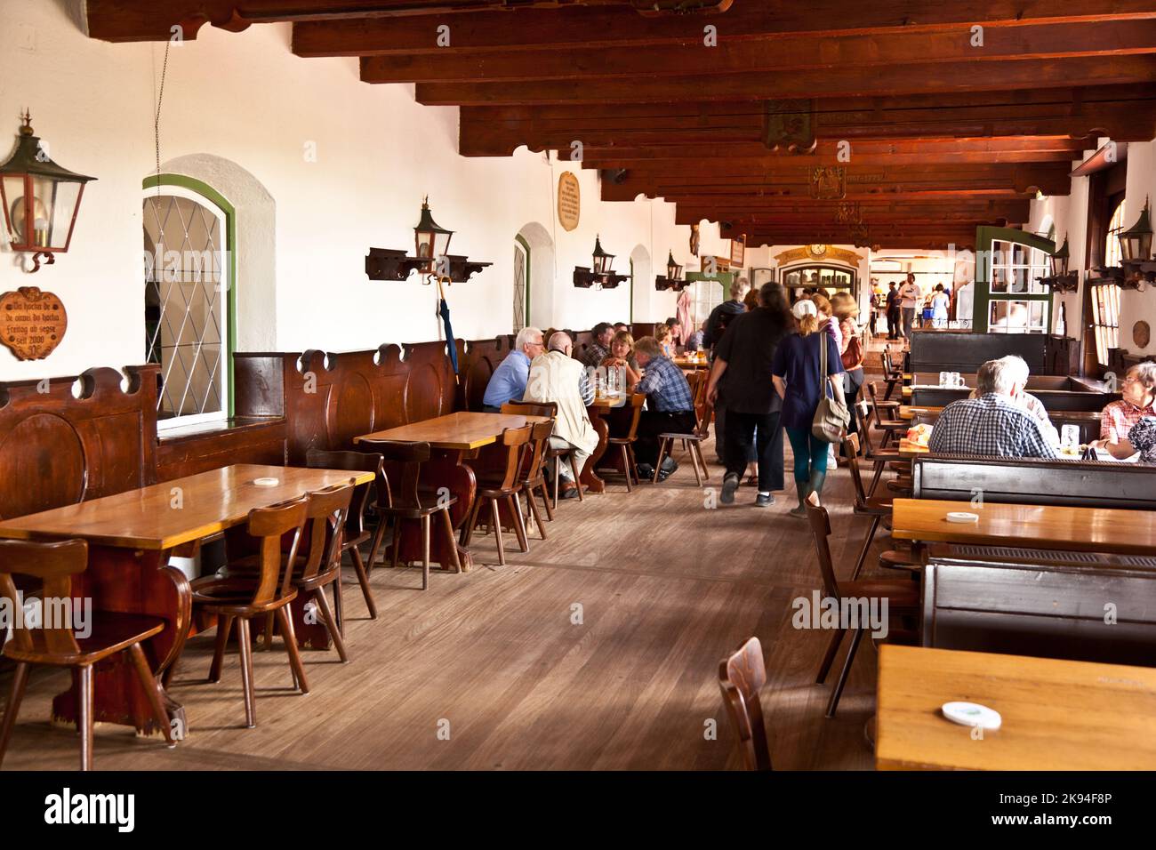 ANDECHS, GERMANY - JULY 11 : people enjoy the famous beer in the ...