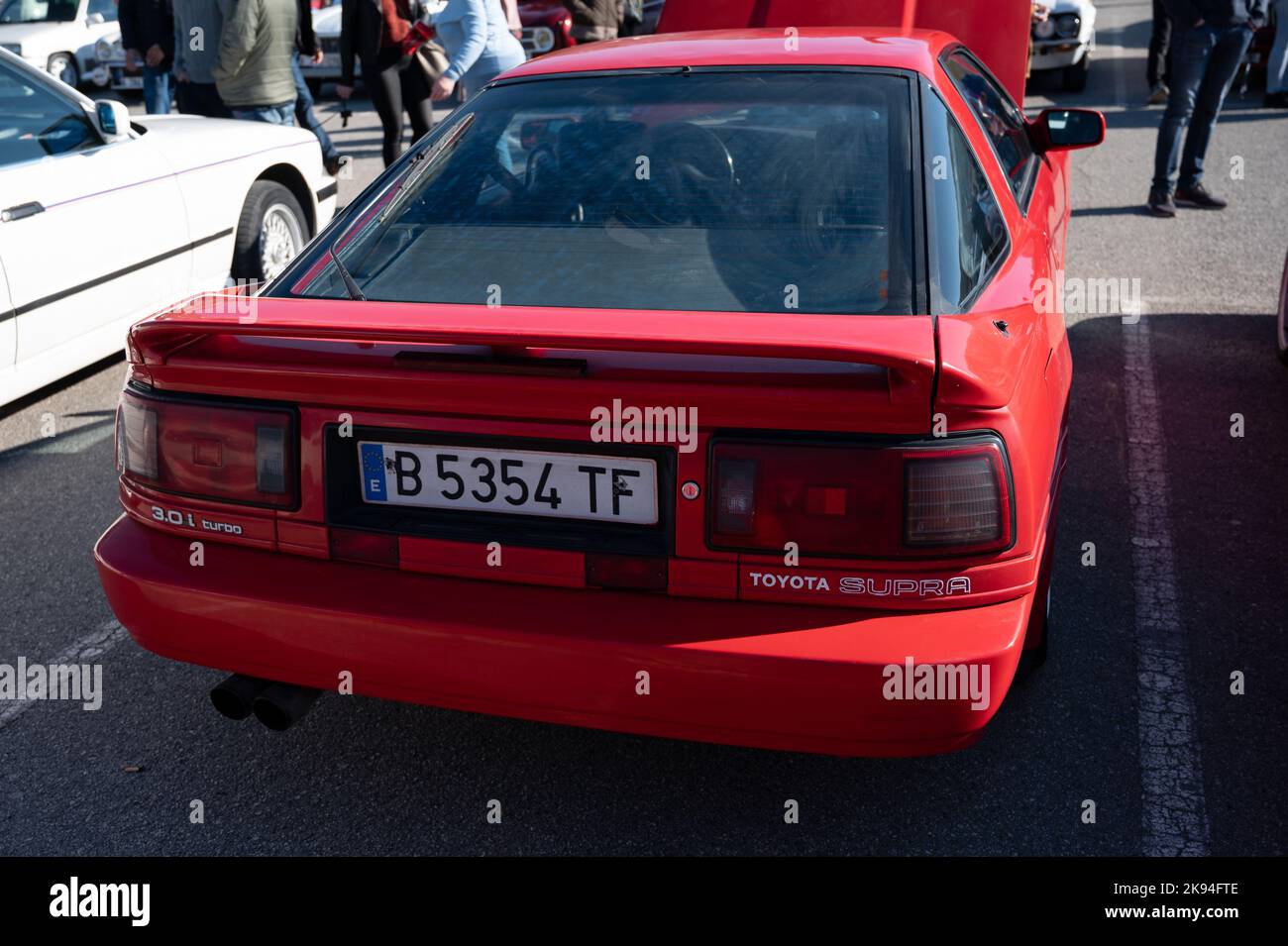A red Toyota Supra A70 car parked outside Stock Photo - Alamy