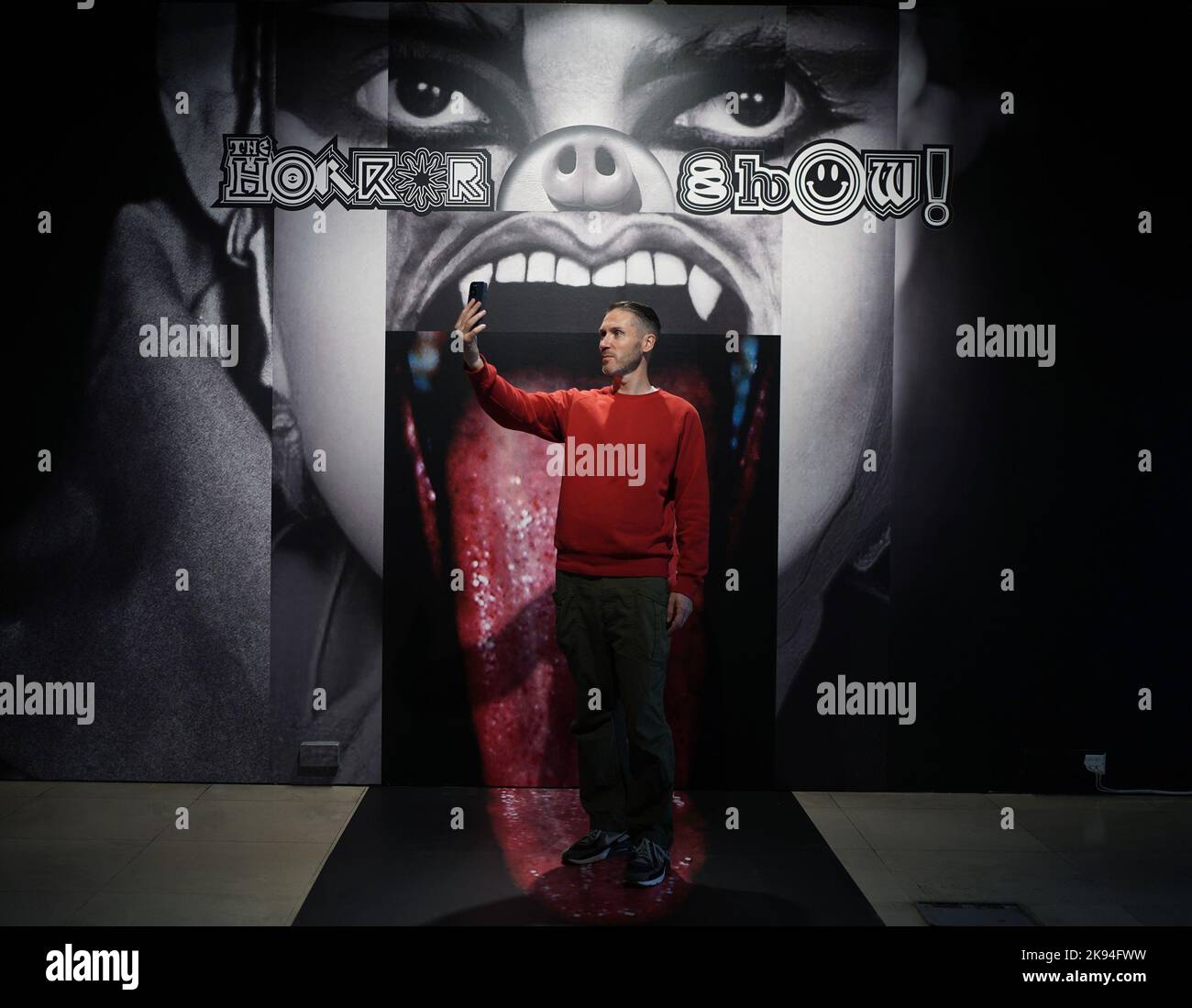 A visitor taking a selfie during the preview for The Horror Show ...