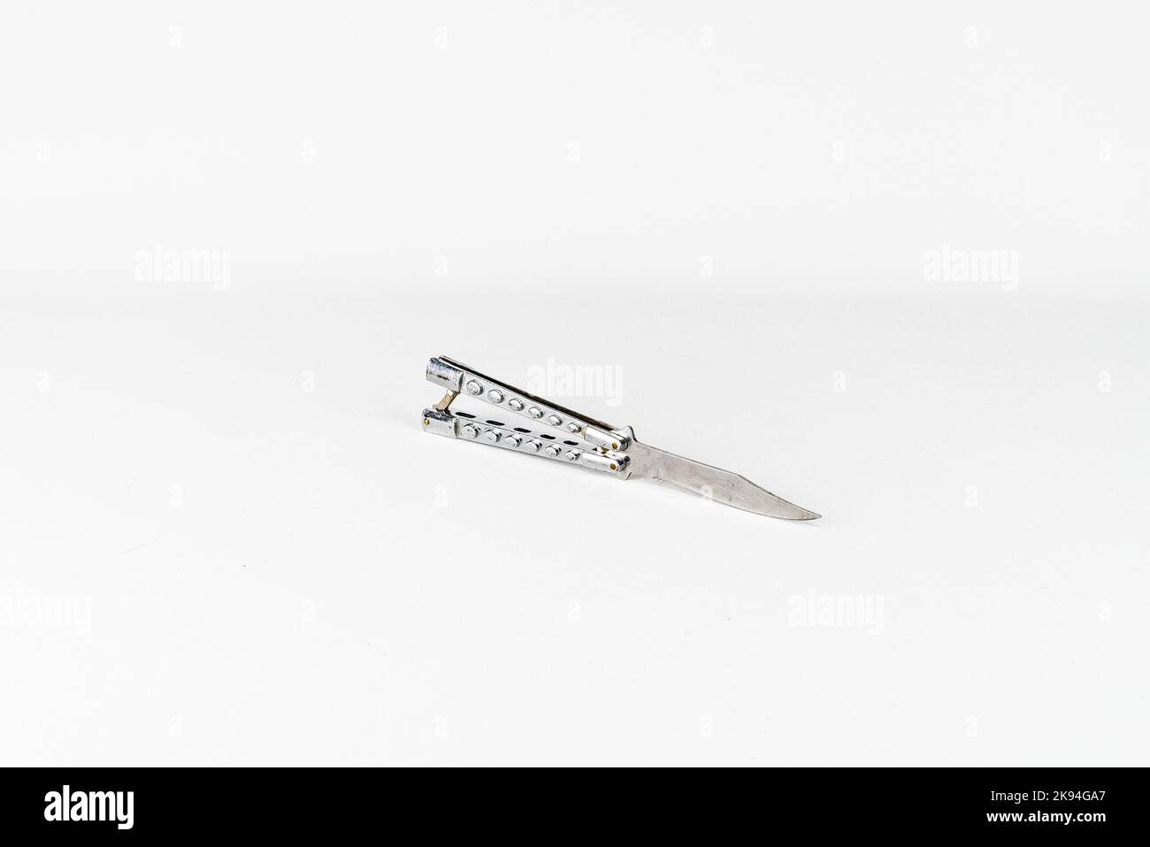 Butterfly knife on white background isolated. Stainless steel sharp ...