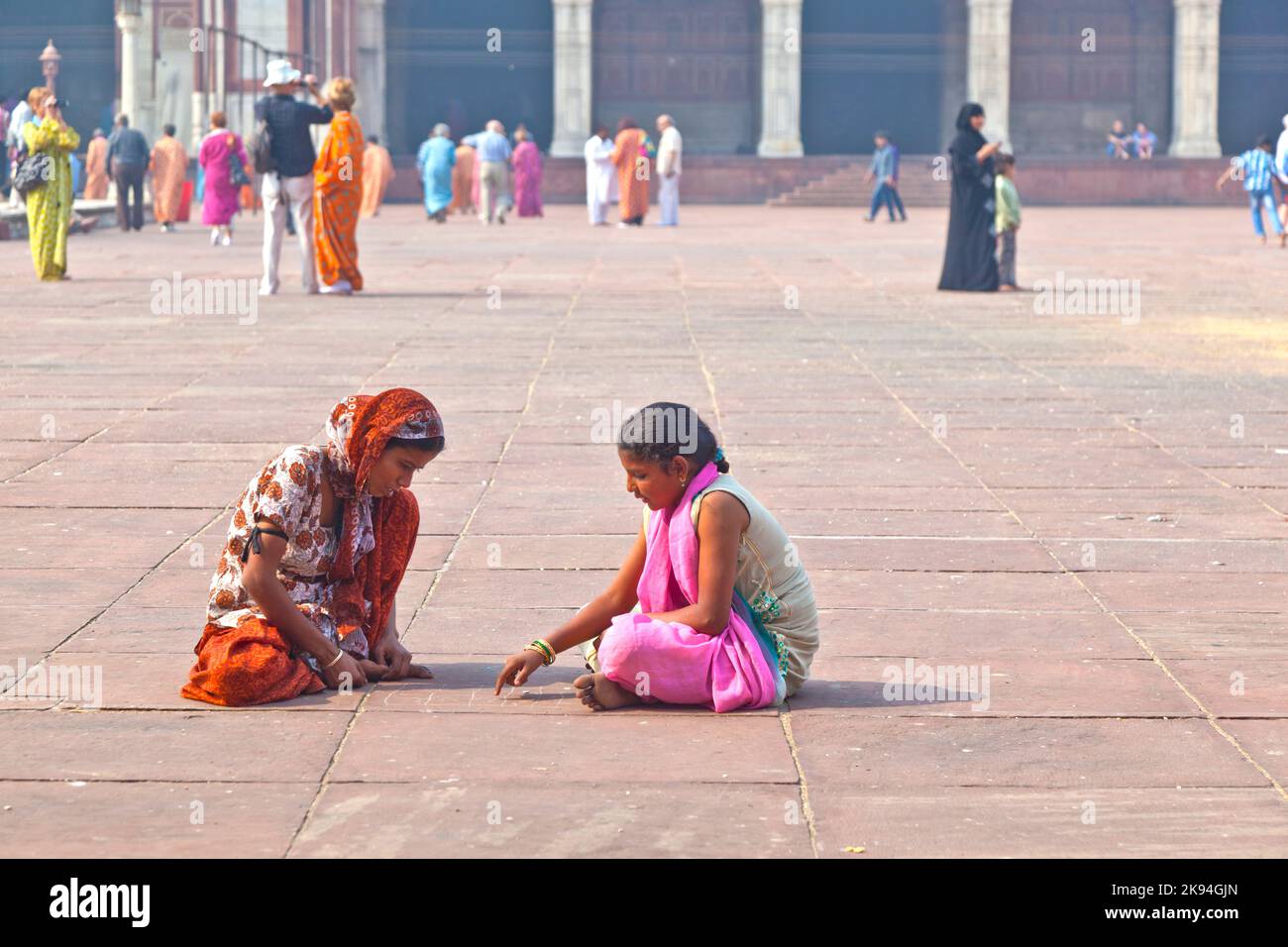 DELHI - NOVEMBER 09: Muslim pilgrim family visiting the Jama Masjid ...