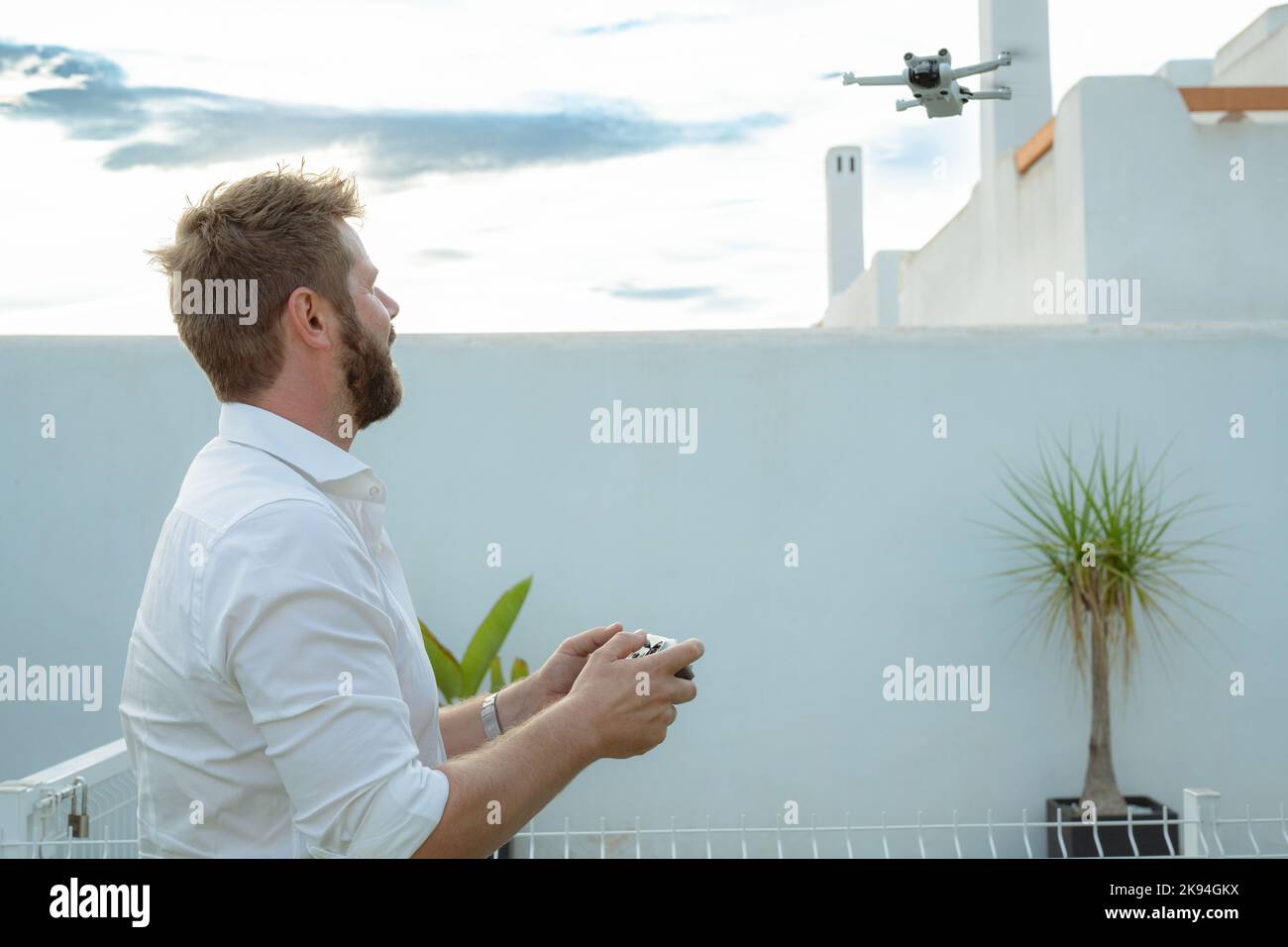 Man controlling drone in outdoors image with remote control Stock Photo ...