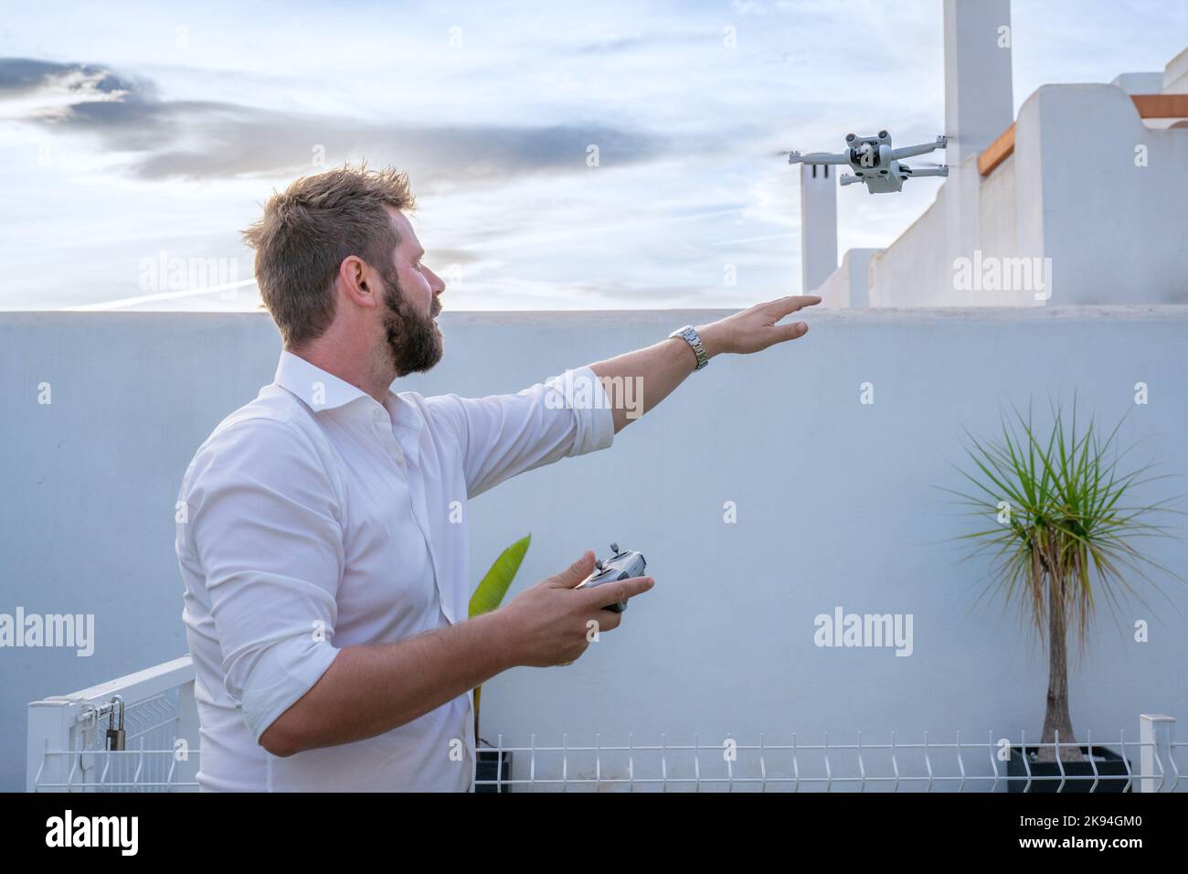 Man controlling drone in outdoors image with remote control Stock Photo ...