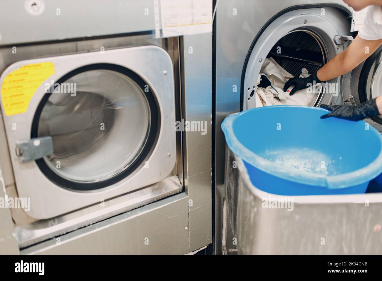 Dry cleaning with washing machine dryer spin clothes. Clean cloth ...