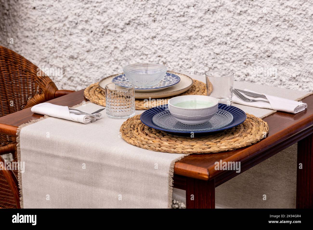 A dining table set in a cafe outdoors Stock Photo - Alamy